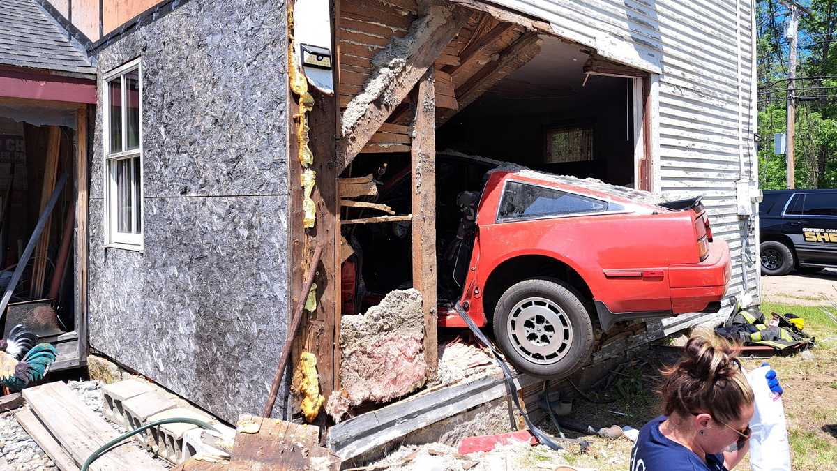 Officials: 1 dead, 1 hospitalized after vehicle crashes into Maine home
