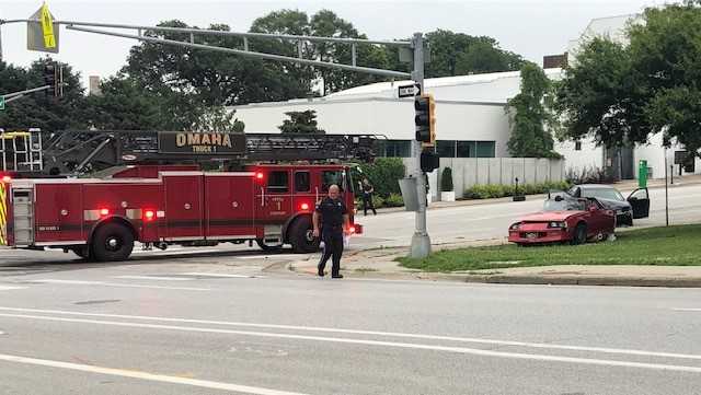 Paramedics perform CPR on person following crash