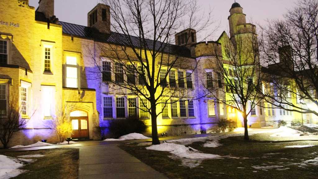 SUNY Plattsburgh building lit with colors of Ukrainian flag
