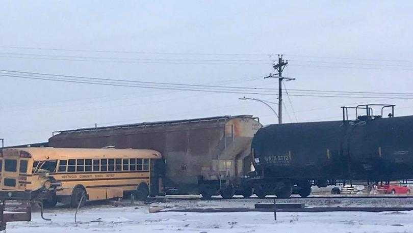 No one hurt when train slams into Iowa school bus