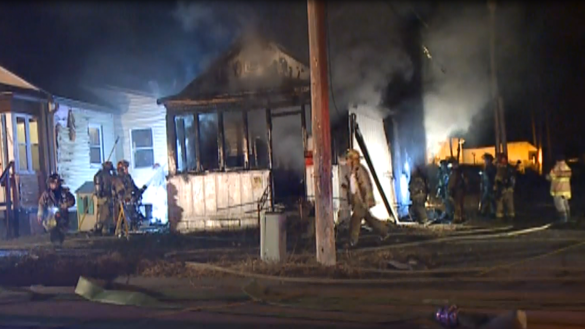 Firefighters battle house fire near 26th and J streets