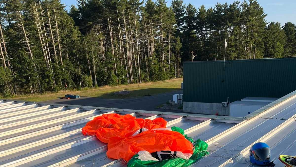 Skydiver makes 'hard landing' on top of industrial building in Orange