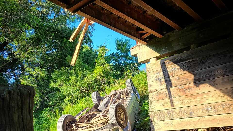 Iowa driver lucky to be alive after truck lands on its top in creek