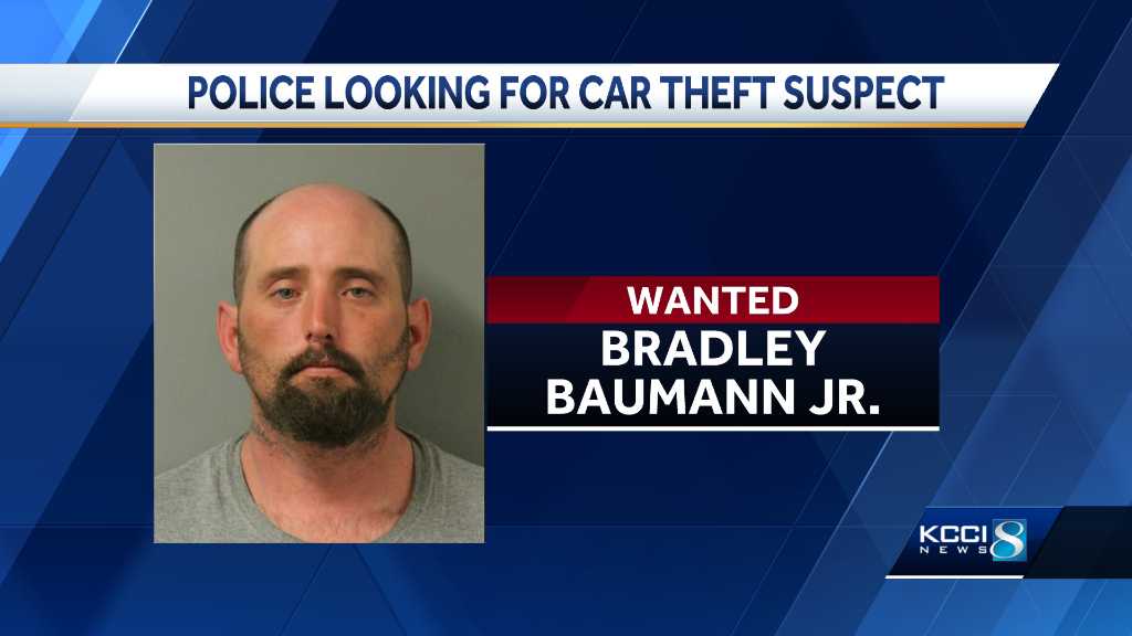 Police search for 'armed and dangerous' car theft suspect