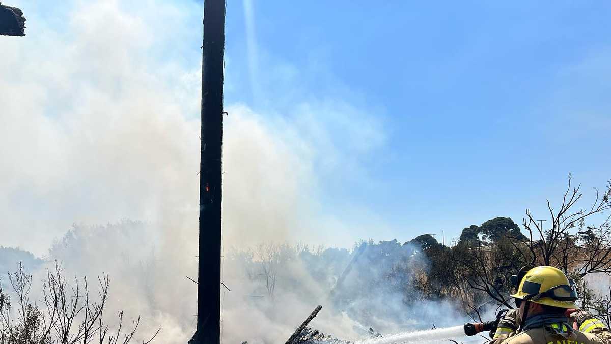 Vegetation fire turns into structure fire in Greenfield