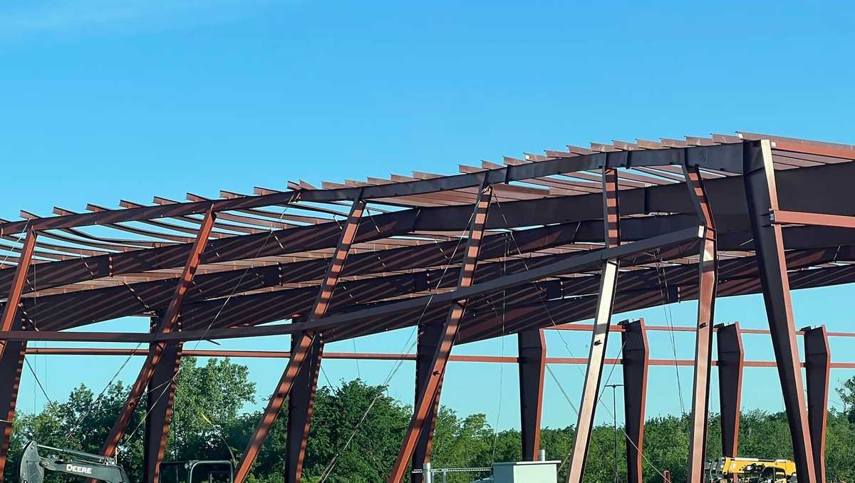 Westmoore High School practice facility frame buckles in storms