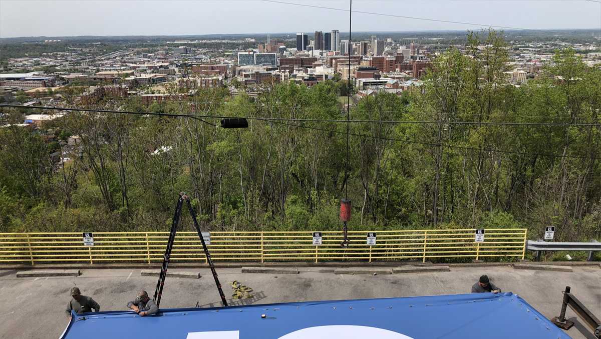PHOTOS: New WVTM 13 sign going up atop Red Mountain
