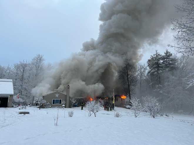 Crews battle snowy roads while trying to put out fire in Wakefield, NH