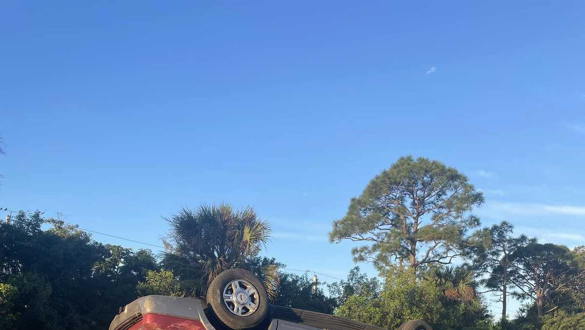 Vehicle rolls over on railroad tracks in South Florida