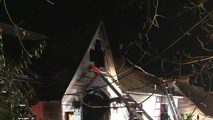 Firefighters rescue person from house fire