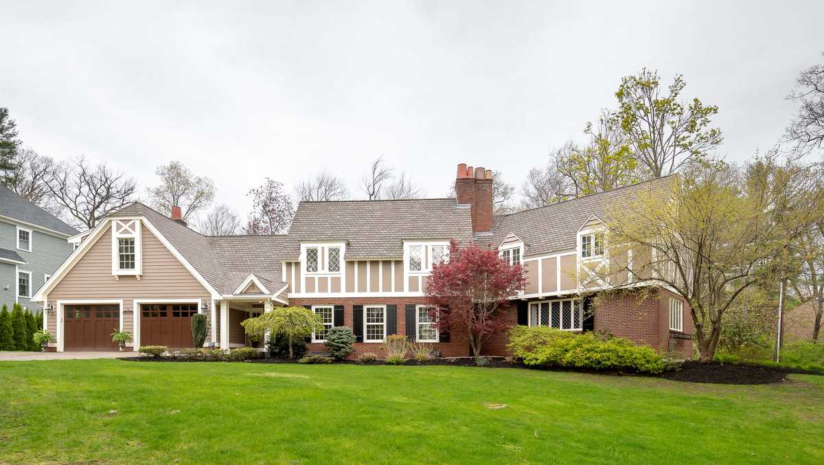 $2.05M home has hidden library, surprises at every turn