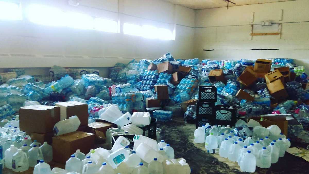 Flint residents outraged after hundreds of bottled water cases found in ...