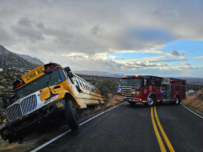 Bus slides off roadway in Albuquerque on Thursday