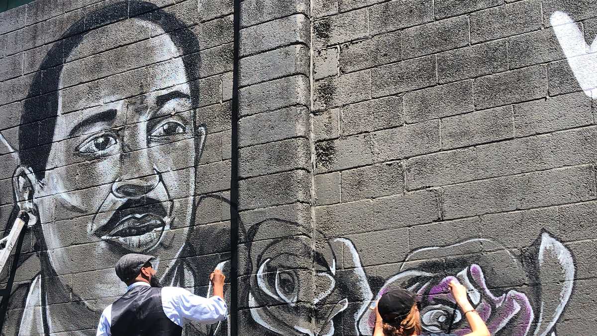 Greenville artists collaborate on social equity murals on city buildings