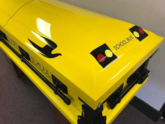 A beloved school bus driver was laid to rest in a custom casket that ...