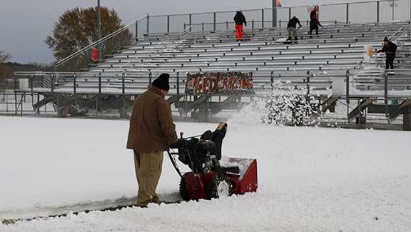 Rush on to clear snow from high school football fields ahead of playoffs