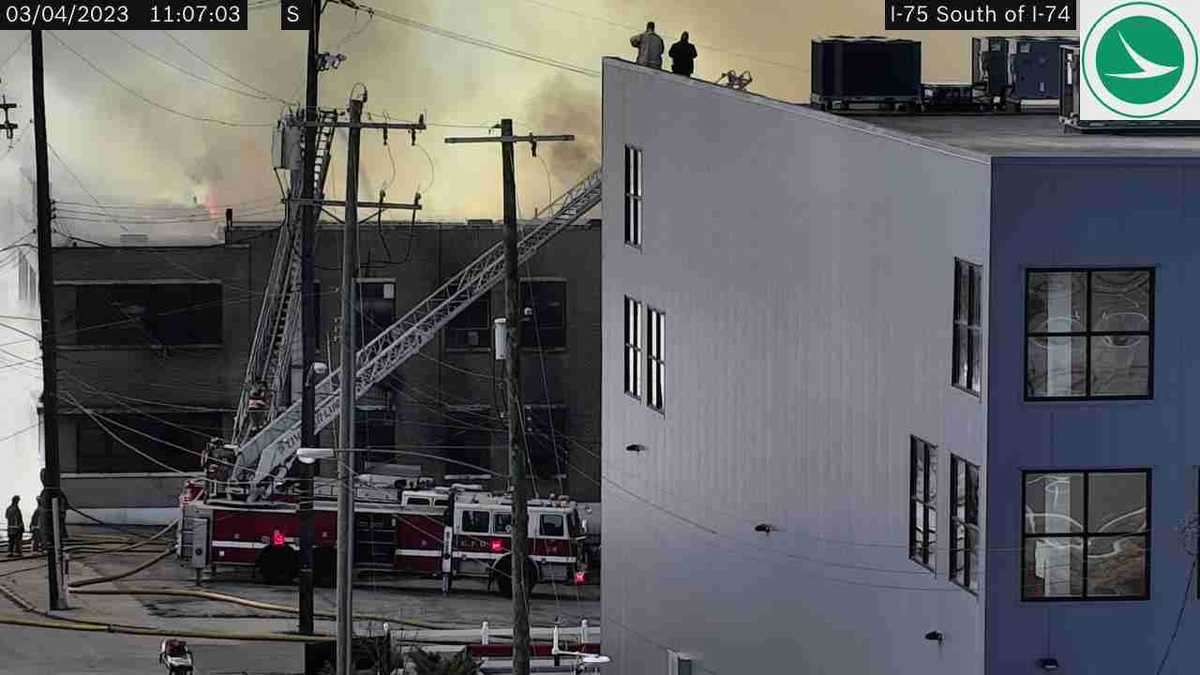 PHOTOS: Crews battling large fire in Camp Washington Saturday morning