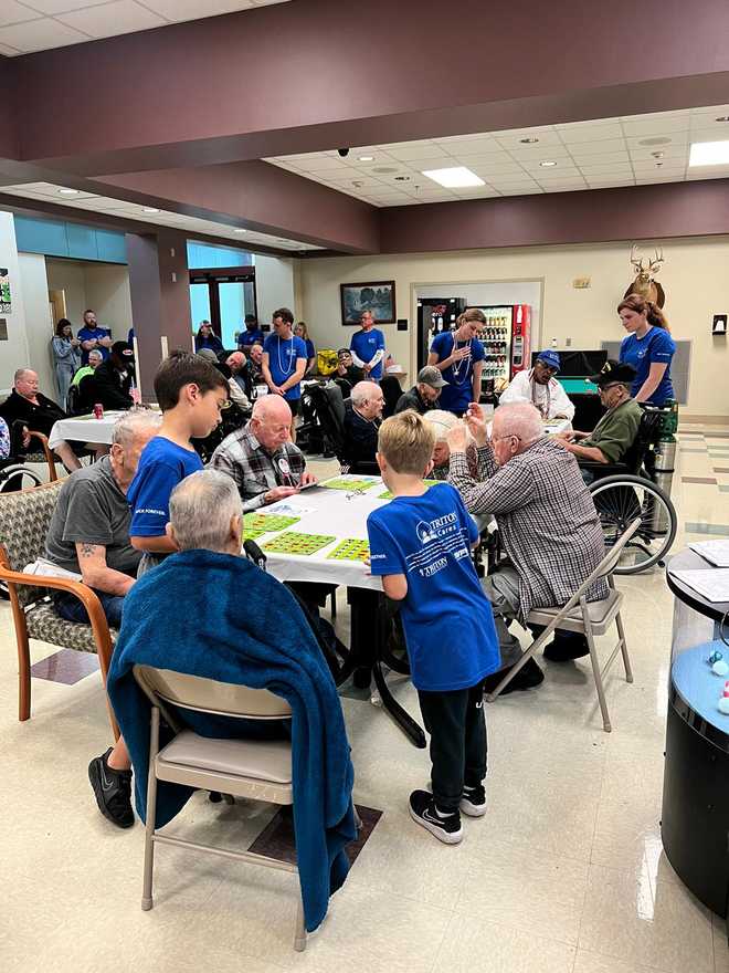 Volunteers spend the day giving back to Veterans in Reserve