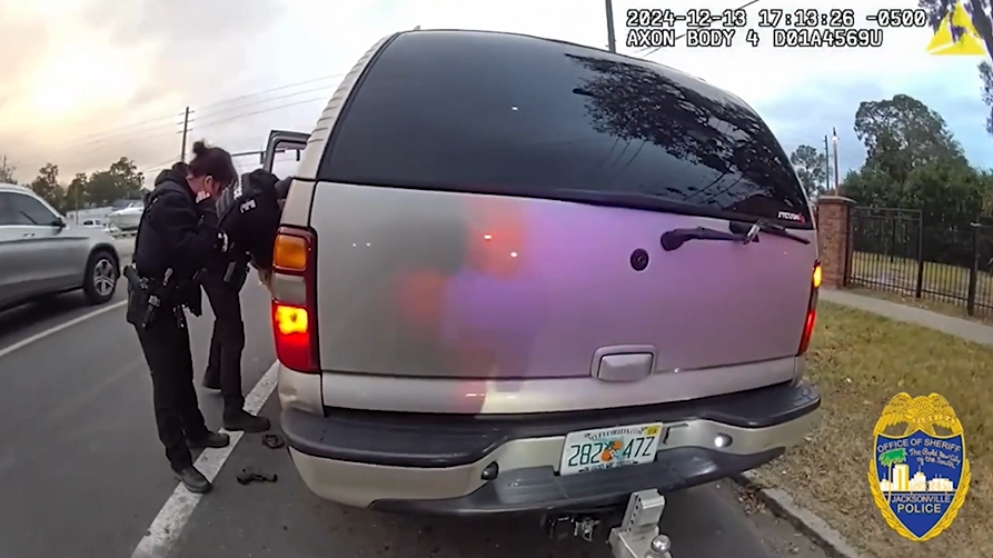 Florida officer shoots man with his own gun, report says