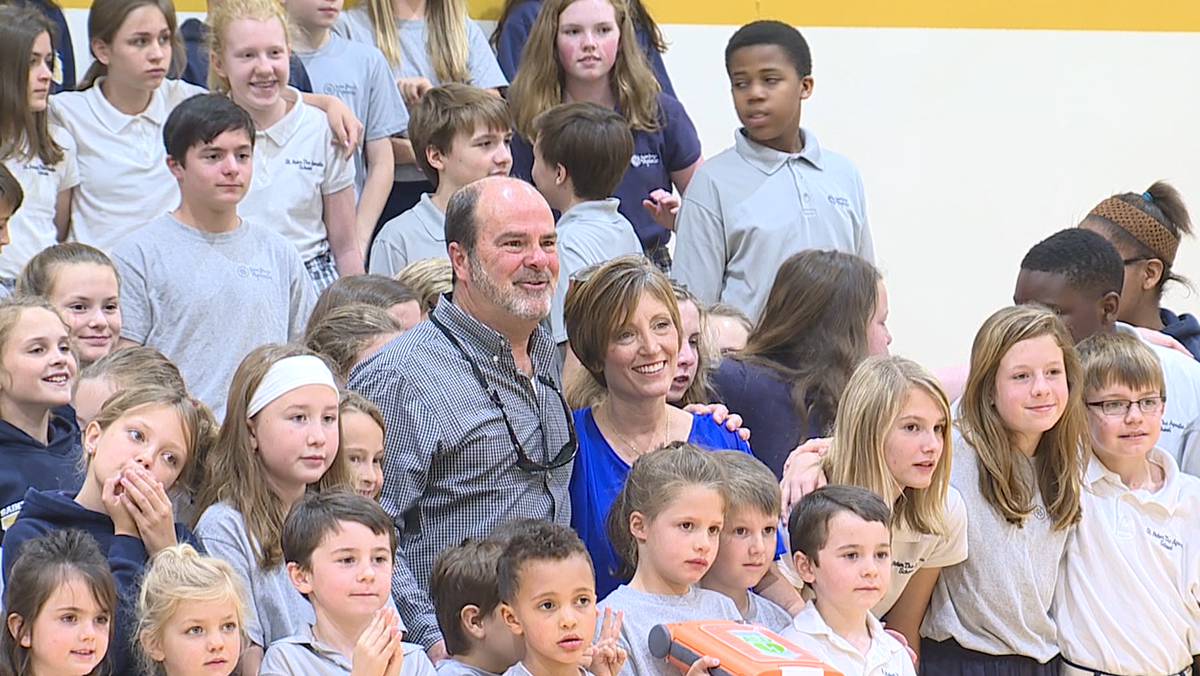 Family of Cory Joseph Wilson donates AED to school