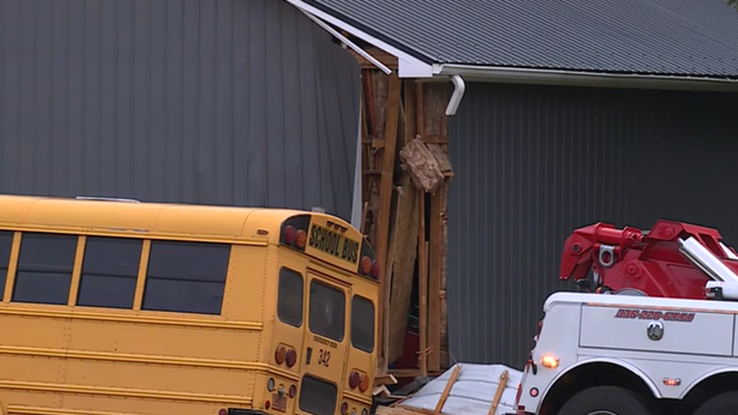 PHOTOS: Alamance school bus crashes into building