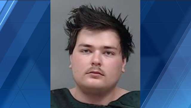 Iowa man charged with killing his family blamed masked intruder