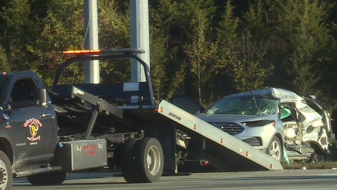 Arrest made after deadly crash between semi-truck and car in Alexandria