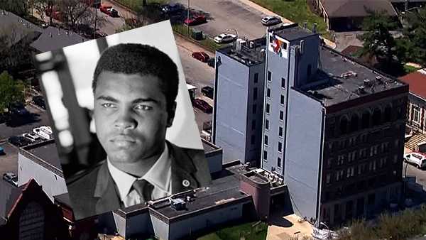 Artist Shepard Fairey painting 7-story Muhammad Ali mural in Louisville