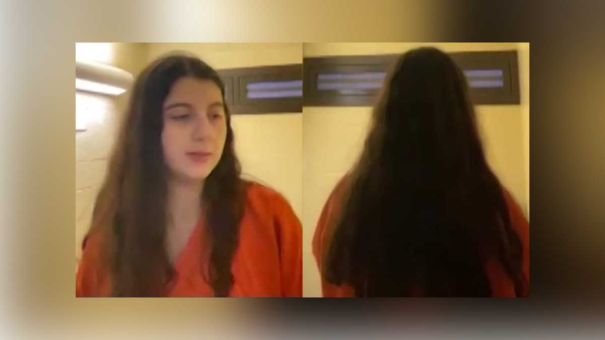 Woman charged with murder turns back on judge during arraignment