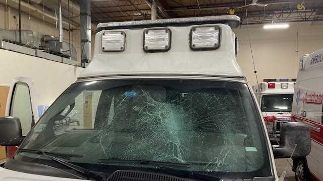 Flying ice smashes windshield of ambulance with patient aboard