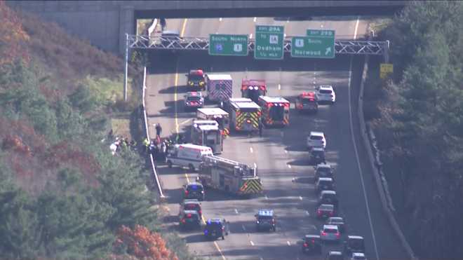 Medical transport van involved in rollover crash on Interstate 95 in Dedham