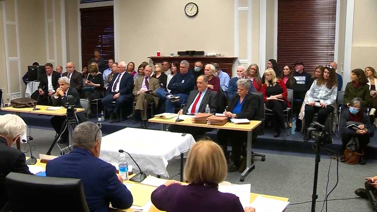 Siblings convicted in Fells Acres case not present at pardon hearing