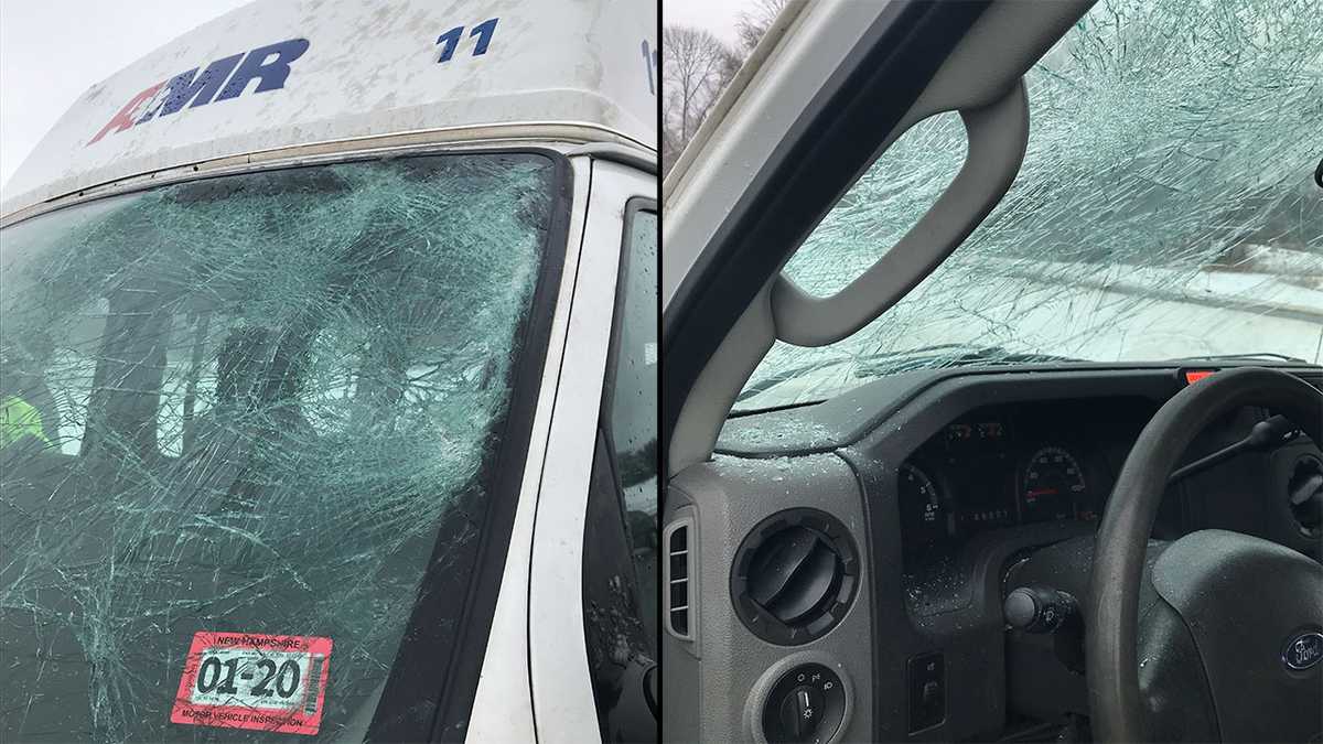 Plow truck pushes snow, ice off overpass in Newington, striking AMR van