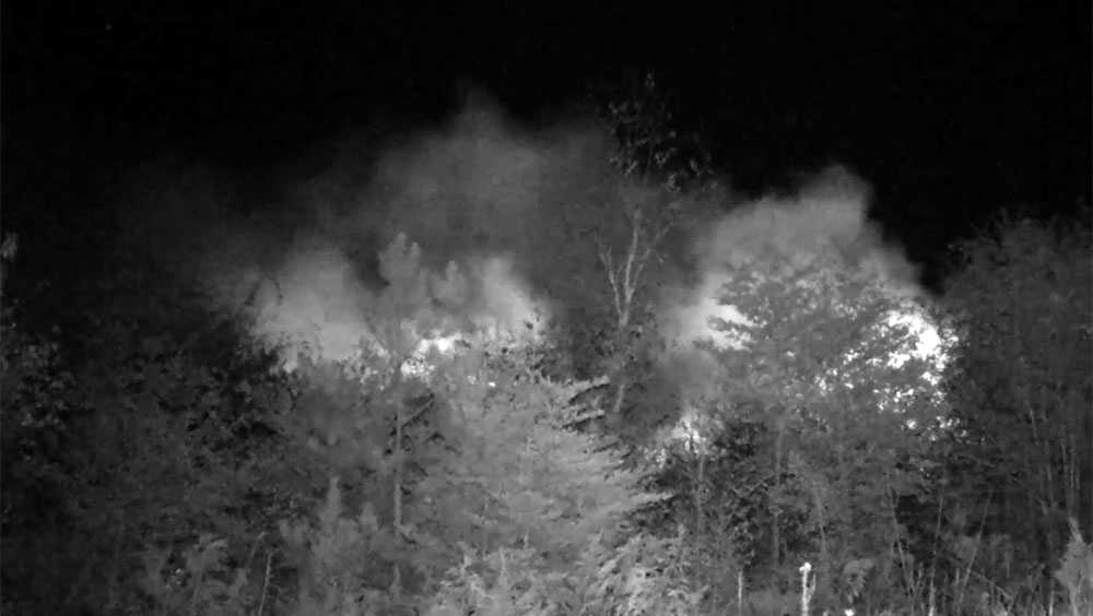 Firefighters battle flames in Anderson County woods