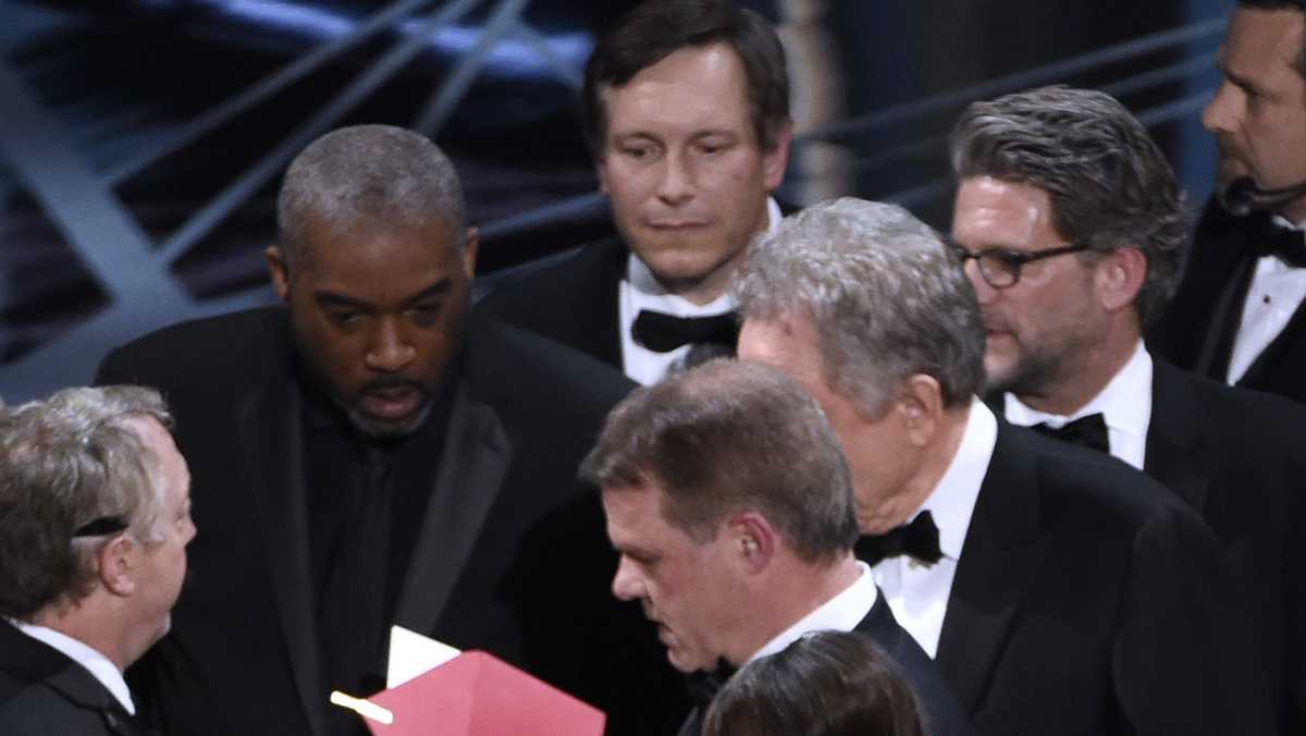 Whoops face: Expressions of surprise, chagrin from the Oscars screw up