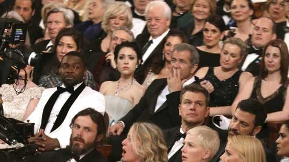 Whoops face: Expressions of surprise, chagrin from the Oscars screw up