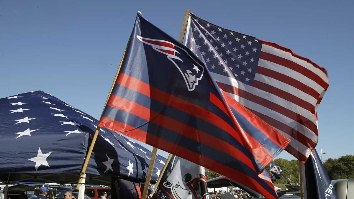 Photos: Patriots stand during national anthem before Panthers game