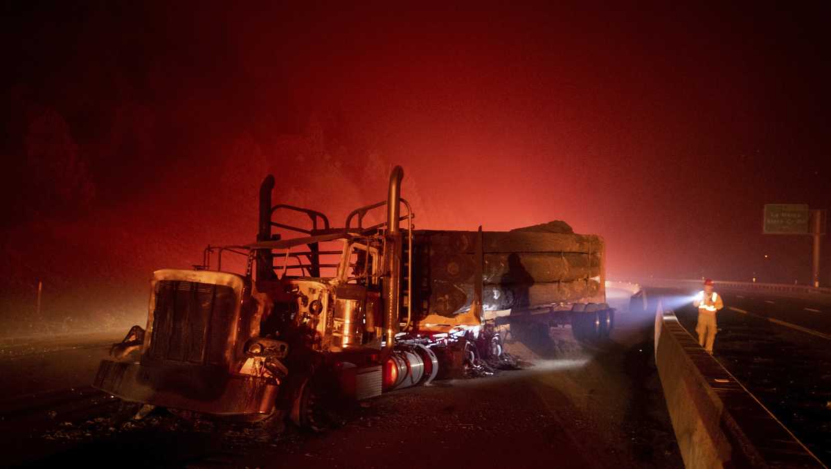 Big rigs abandoned as wildfire scorches California freeway
