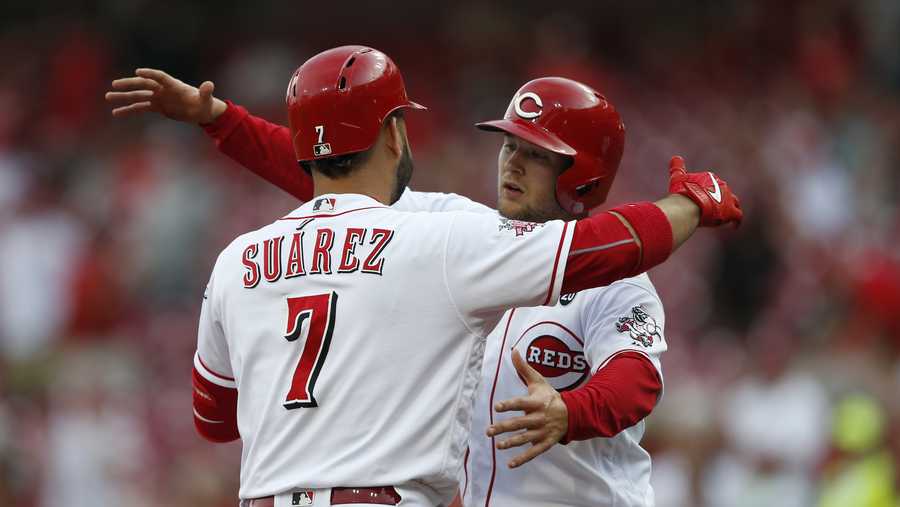 Reds beat Brewers 5-4 in 11 innings