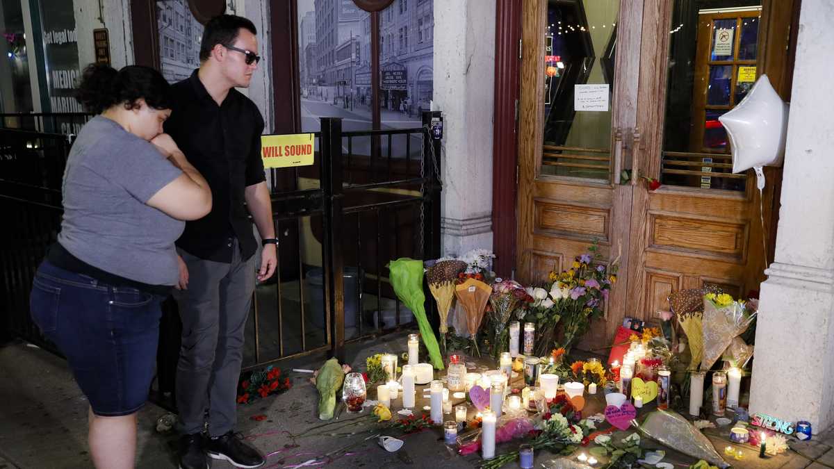 PHOTOS: Thousands attend vigil to remember nine victims killed in ...