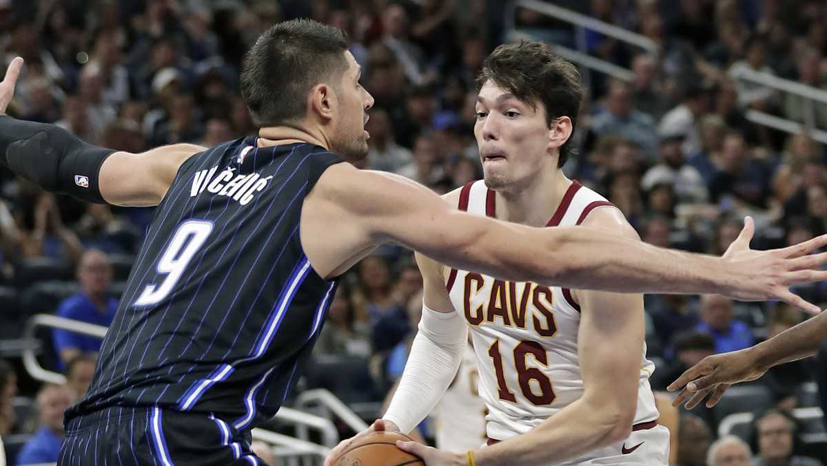 Magic, Vucevic beat Cavaliers in season opener