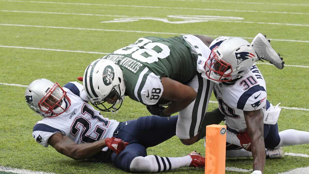 Patriots celebrate comeback win; controversial call costs Jets TD