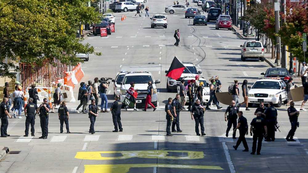 Protestors paint BLM after City of Tulsa removes street sign