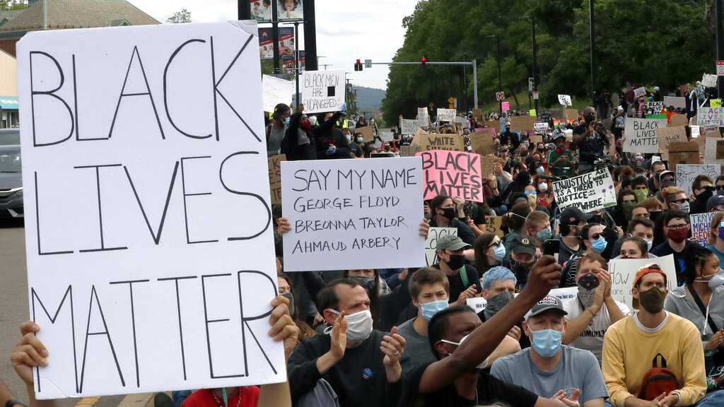 Photos: Thousands protest peacefully in Boston during police brutality ...