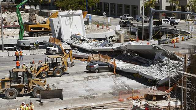 Tearful families wait as bodies remain under failed bridge
