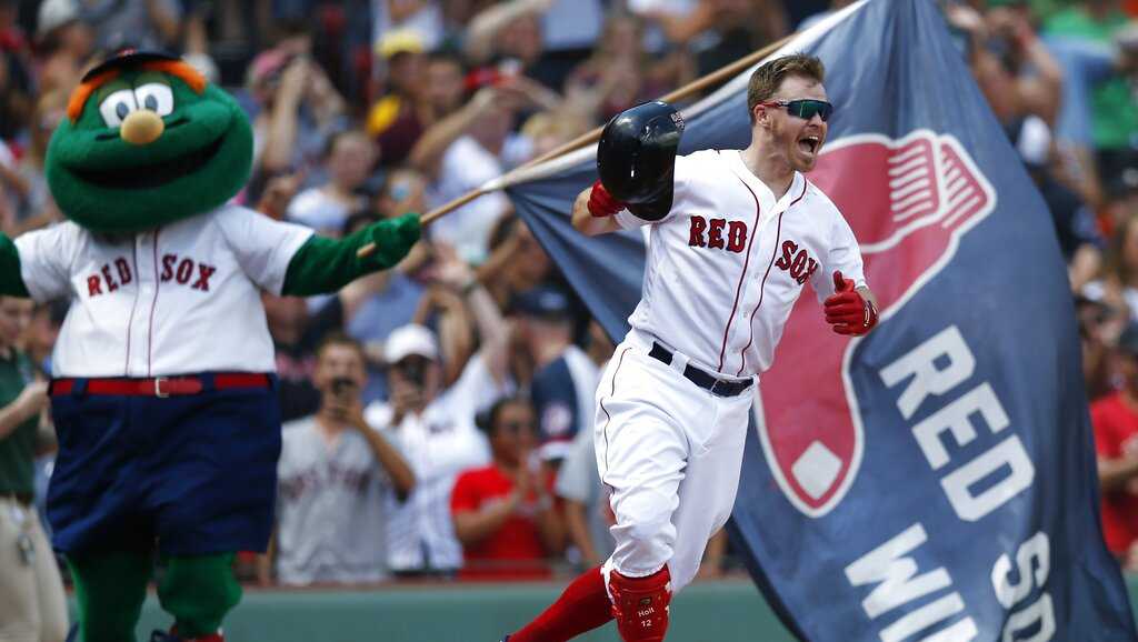 After two week wait, Holt, Red Sox top Royals to cap suspended game