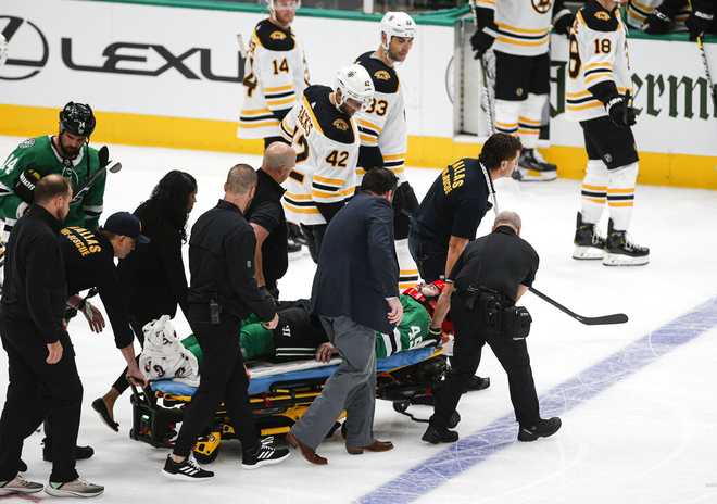 Bruins open defense of their Eastern Conference title with victory