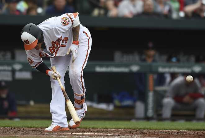 Red Sox pitcher suspended for throwing at Manny Machado