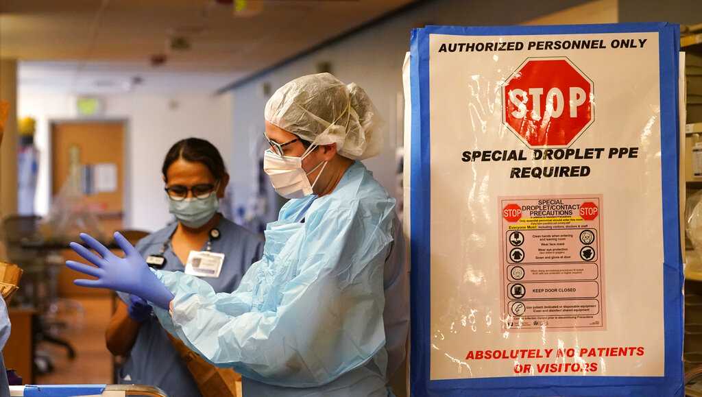 Pandemic's deadliest month in US ends with signs of progress