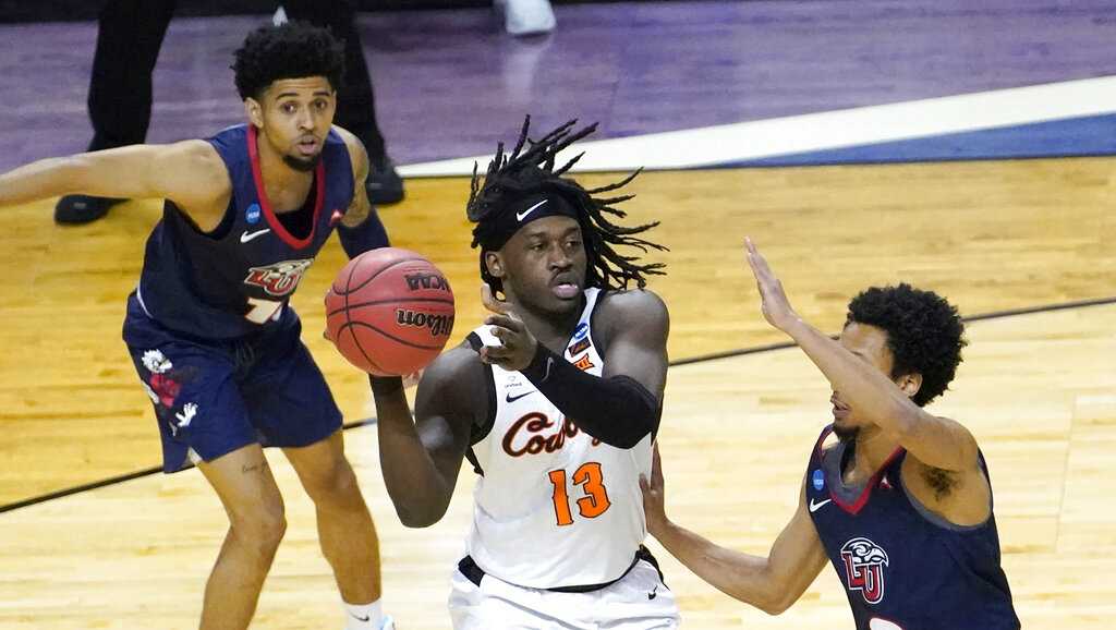 No. 4 Oklahoma State survives No. 13 Liberty 69-60 in NCAA